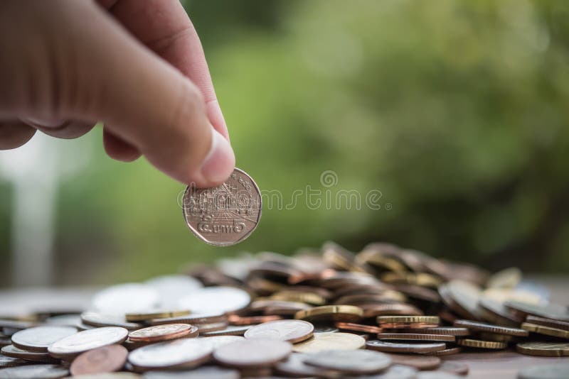 Saving Money Concept . Hand Putting Money Stock Photo - Image of growth ...