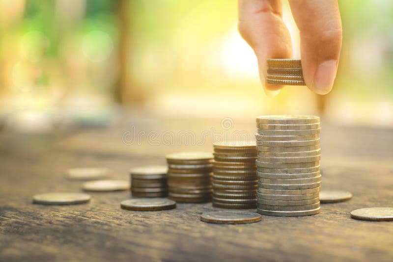 Saving Money Concept with Hand Putting Money Coin Stack Growing ...