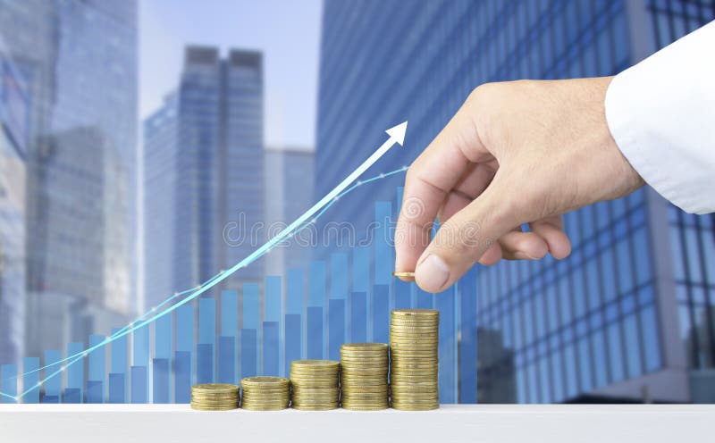 Saving Money and Investment Concept with Stack of Coins and Graph Blue ...