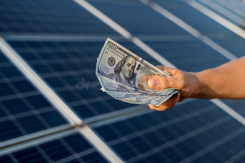 Saving Money with Sun Energy and Solar Panels. Stock Photo - Image of ...