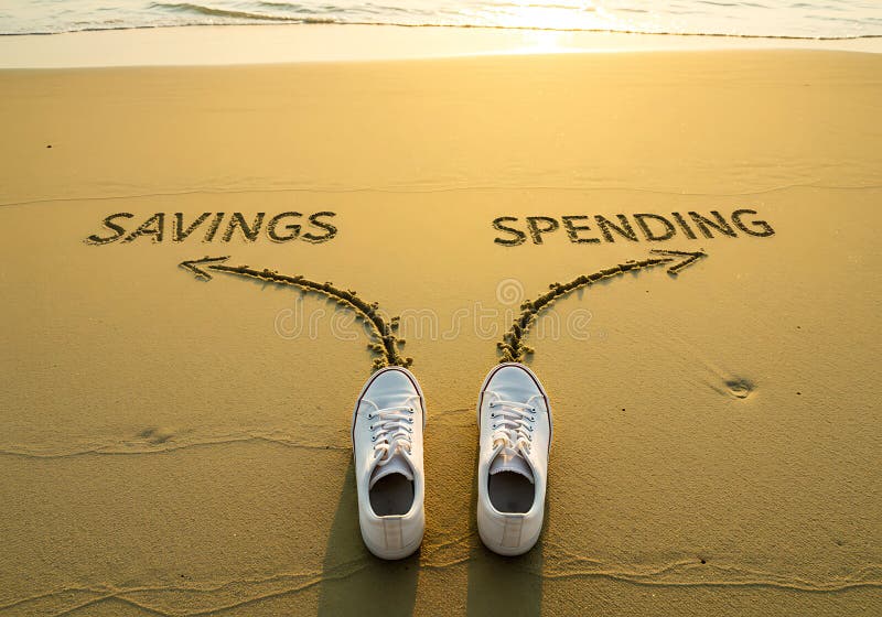 Saving or Spending Concept with Sneakers on Sand Background Stock ...