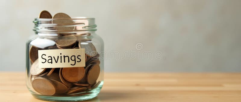 Savings â€“ a Jar Filled with Coins and a Label Showing the Importance ...