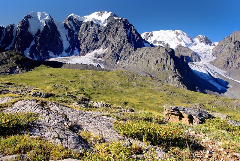 Savlo rock face stock image. Image of peak, skyline, grass - 9525845