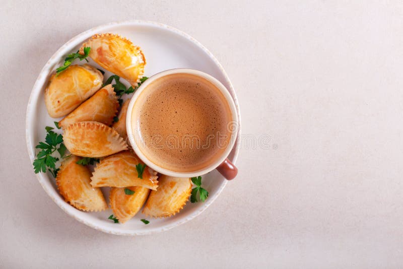 Savory hand pies on plate stock image. Image of overhead - 157339931