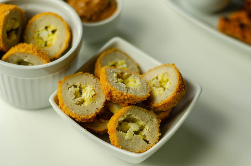 Savory Mini Scotch Eggs in White Ceramic Bowl, Traditional English ...