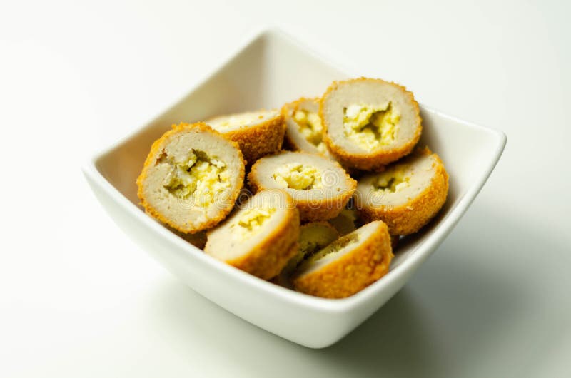 Savory Mini Scotch Eggs in White Ceramic Bowl, Traditional English ...