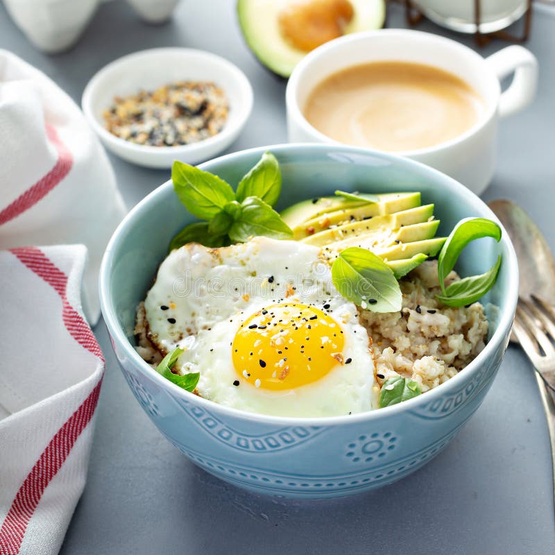 Savory Oatmeal with Egg and Avocado Stock Photo - Image of homemade ...