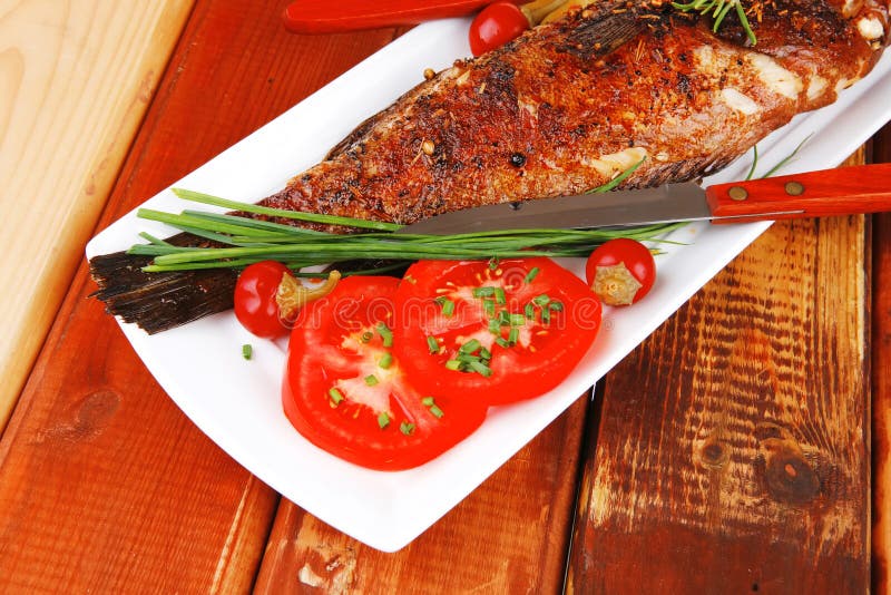 Savory on Wood: Fryed Sunfish Stock Photo - Image of flower, dark: 24176336