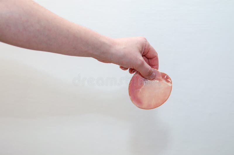 Savoury Ham Held in a Caucasian Hand Stock Image - Image of pink ...