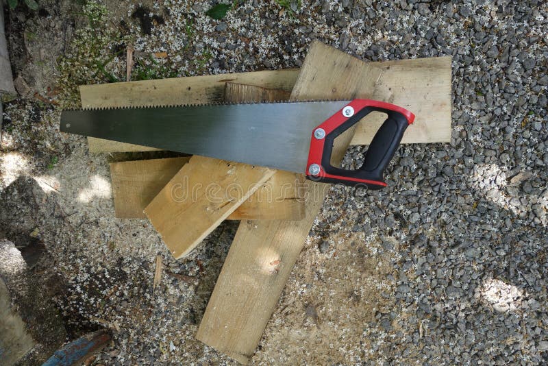 Saw and Board stock image. Image of laying, firewood - 103651251