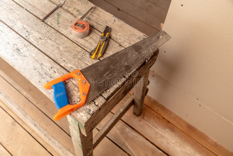 Saw a knife and a meter stock photo. Image of claw, carpenter - 200966818