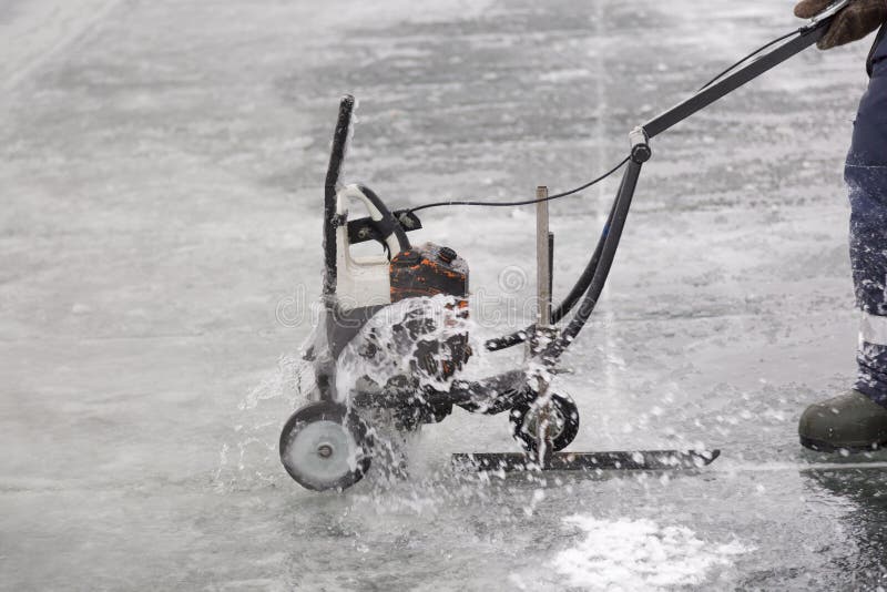 Sawing Machine on the Ice of a Frozen Lake Stock Image - Image of ...