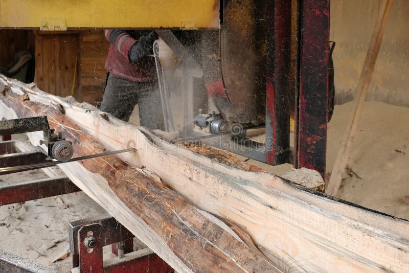 Sawing a Pine Log at an Old Sawmill. Timber Industry Stock Photo ...