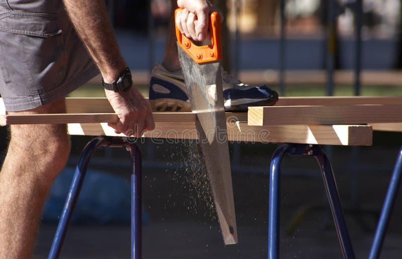 Man sawing a log stock photo. Image of construction, forest - 33530662