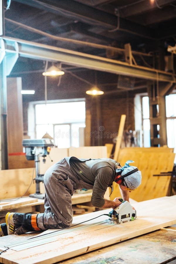 Sawing wood stock image. Image of woodrouter, sawing - 87444605