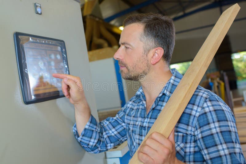 Sawmill Employee Working with Wood Tools and Machinery Stock Image ...
