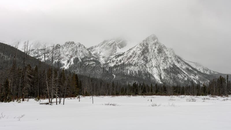Sawtooth Mountain Winter Wilderness with Low Clouds Stock Photo - Image ...