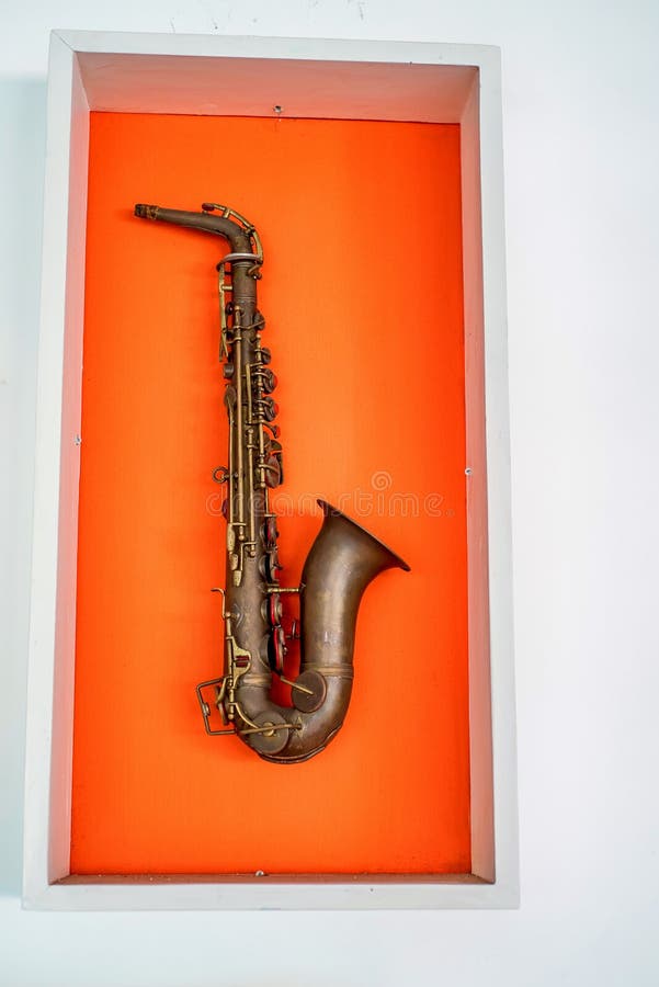Saxophone on Orange Color Background Stock Photo - Image of object ...