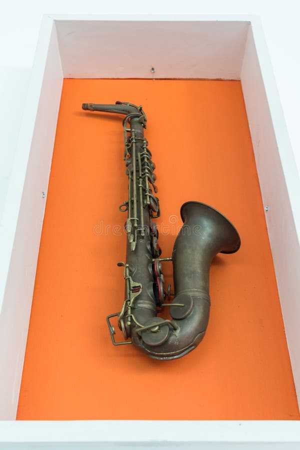 Saxophone On Orange Color Background Stock Image - Image of brass ...