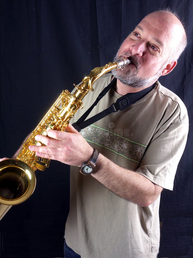 The saxophone player stock image. Image of bald, face - 18667091