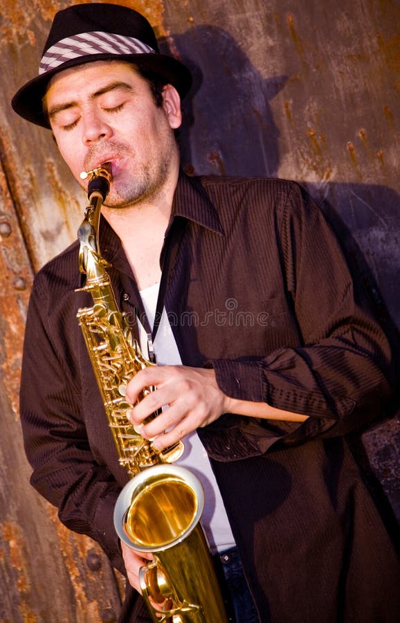 Side View of Man Playing Saxophone Stock Photo - Image of casual ...