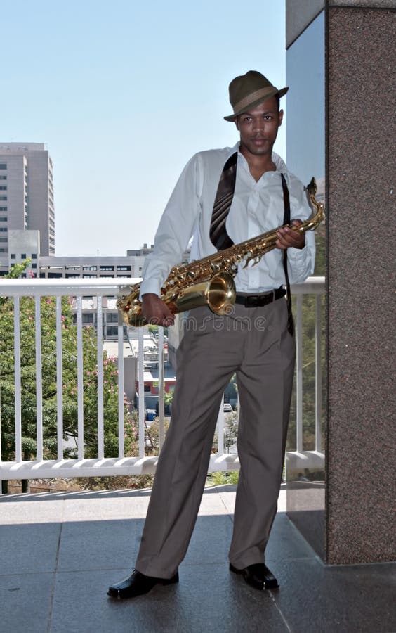 Handsome Man Playing the Saxophone Stock Image - Image of white, player ...