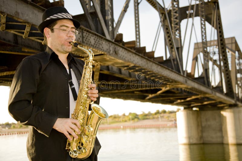 Saxophone Player stock image. Image of grungy, male, ironwork - 12156401