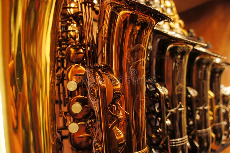 Saxophones in store 2 stock image. Image of instrument - 71914355
