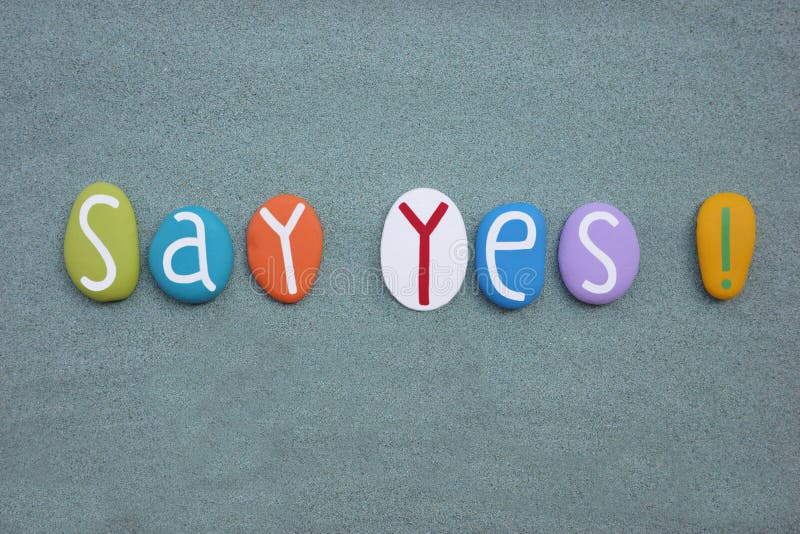 Say Yes, Creative Slogan Composed with Multi Colored Stone Letters Over ...