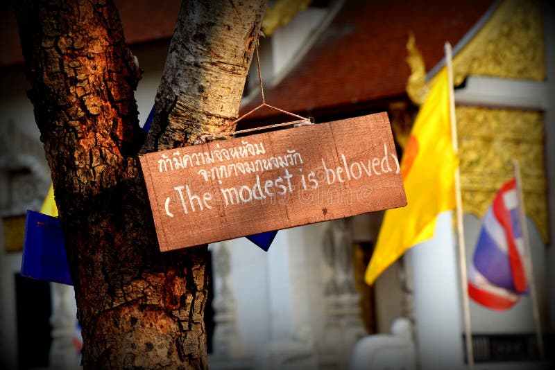 Saying on board stock image. Image of modest, chiang - 79639893