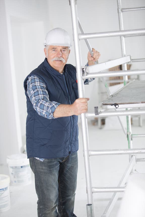 Scaffold builder at work stock image. Image of ladder - 259236747