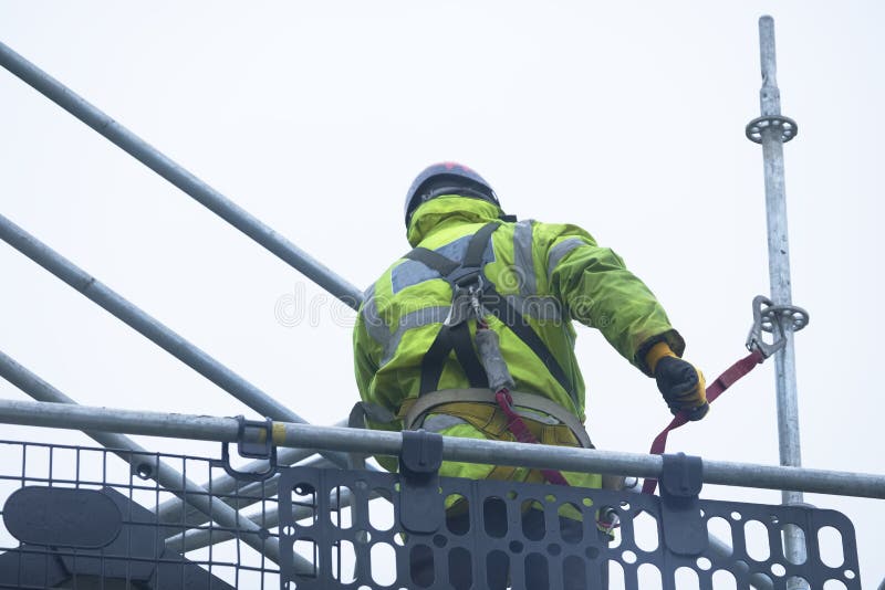 Scaffold Worker Dismantling Access Structure on Construction Building ...