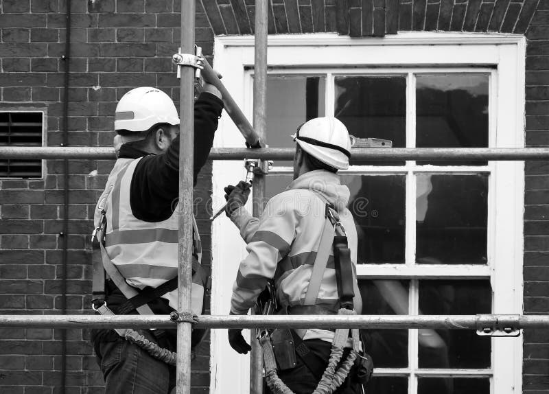 Scaffolders in city center editorial stock image. Image of outdoor ...