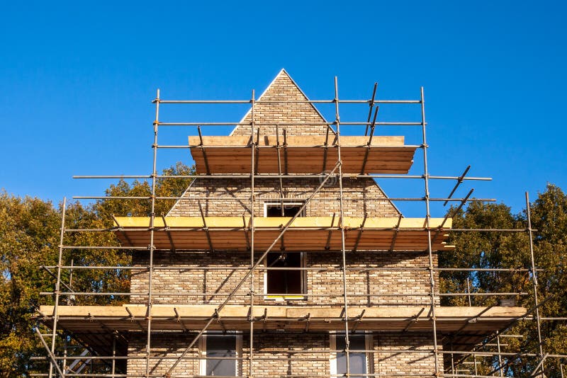 Scaffolding Around a New House Stock Photo - Image of estate, home ...