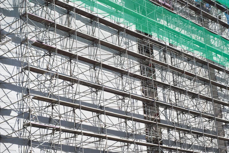 Scaffolding with Green Net stock image. Image of industry - 29801047