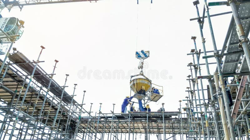 Scaffolding and Concrete Bucket Editorial Stock Photo - Image of ...