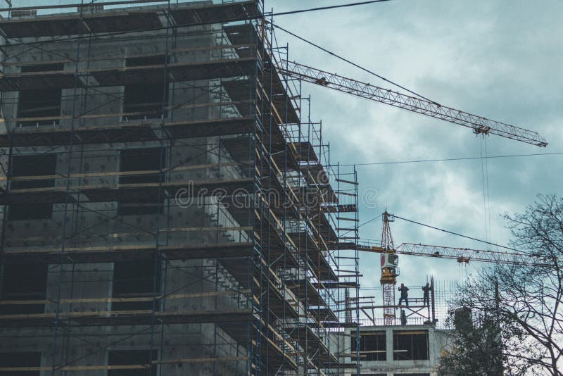 Scaffolding Construction Workers and Crane Development Built Project ...