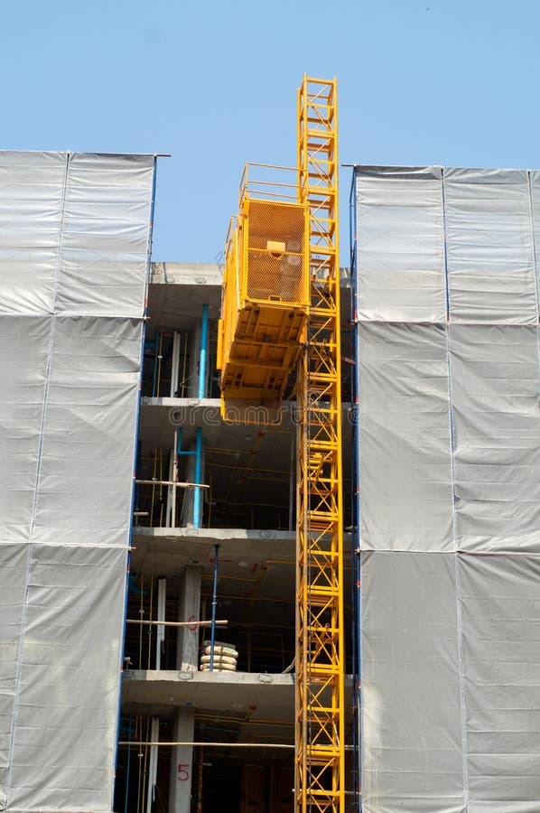 Scaffolding and elevator stock image. Image of scaffolding - 20986597