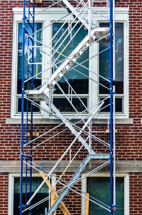 Scaffolding on the Exterior of a Red Brick Building S Windows Stock ...