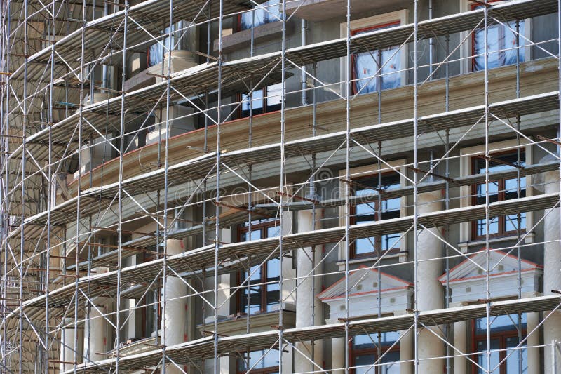 Scaffolding at the Facade of a Building Under Construction, Multi ...