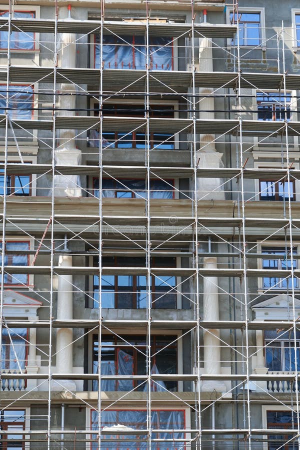 Scaffolding at the Facade of a Building Under Construction, Multi ...