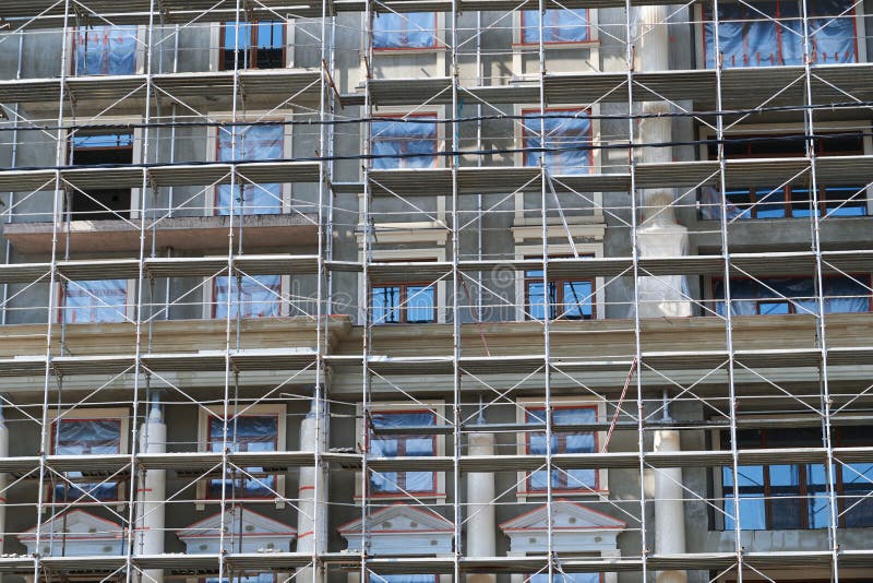 Scaffolding at the Facade of a Building Under Construction, Multi ...