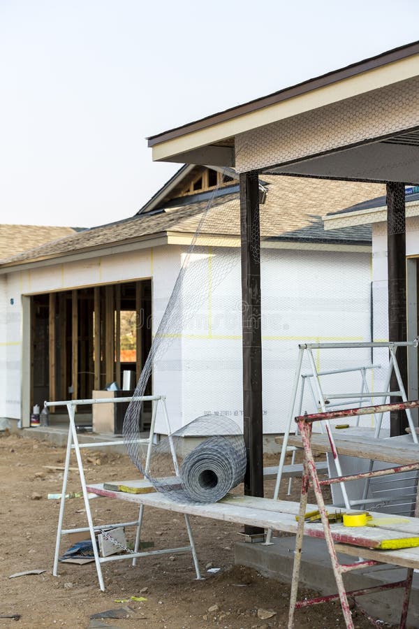 Scaffolding Holding Net Wire and Construction Workers Tools Outside New ...