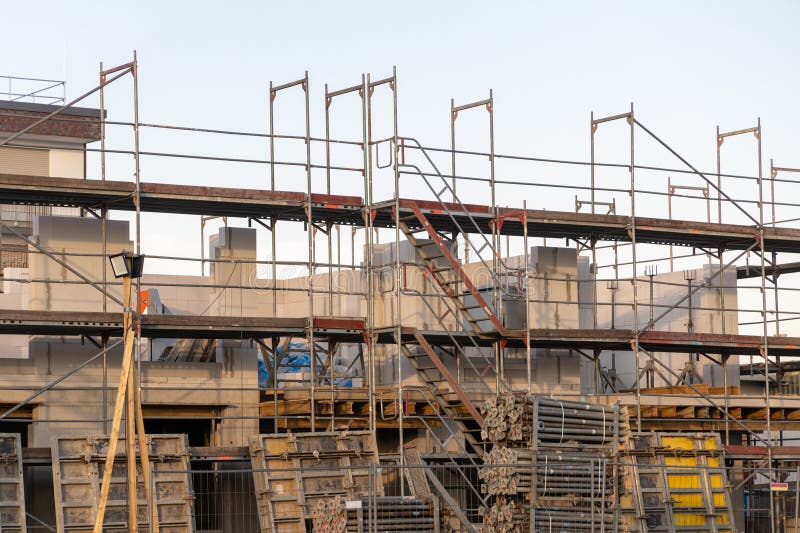 Scaffolding during House Construction. Installation of Scaffolding at a ...