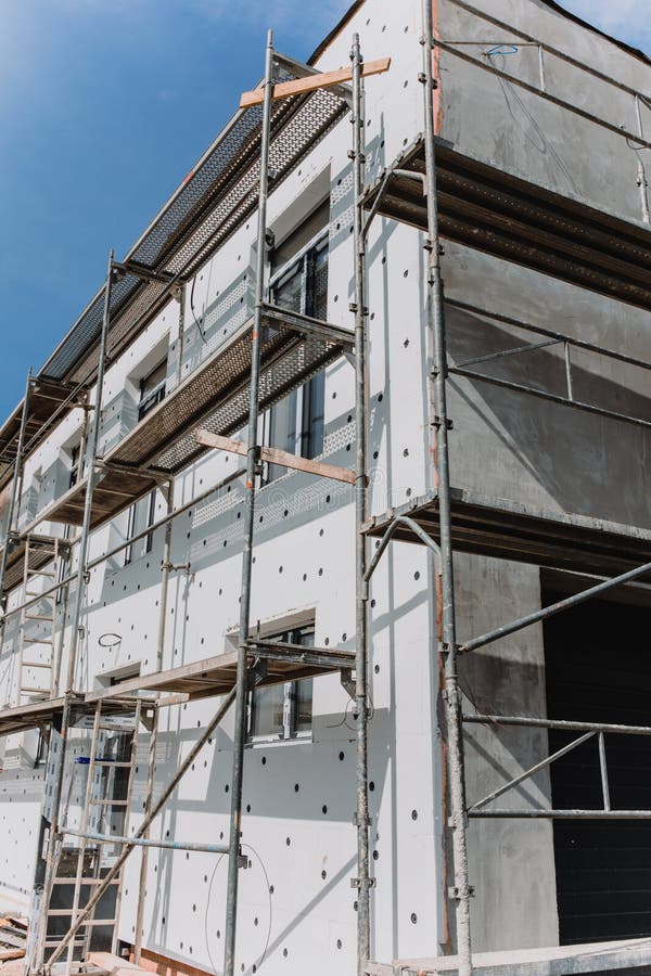 Scaffolding on House Facade,modern Building Under Construction Stock ...