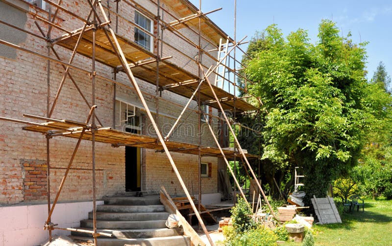 Scaffolding on the house stock photo. Image of building - 35776030