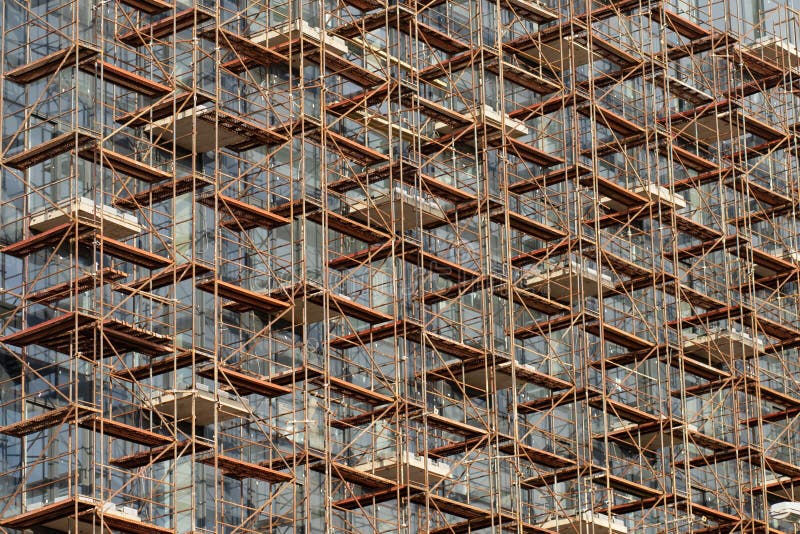 Scaffolding, Metal Supports for Construction Workers on a House Under ...