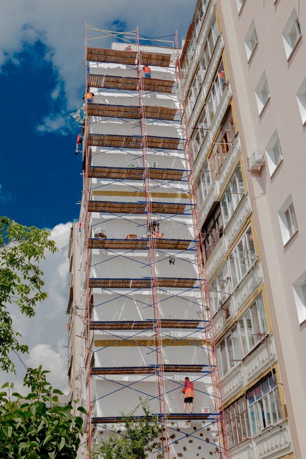 Scaffolding on a Multistory Building. Warming of the Outer Wall Panel ...