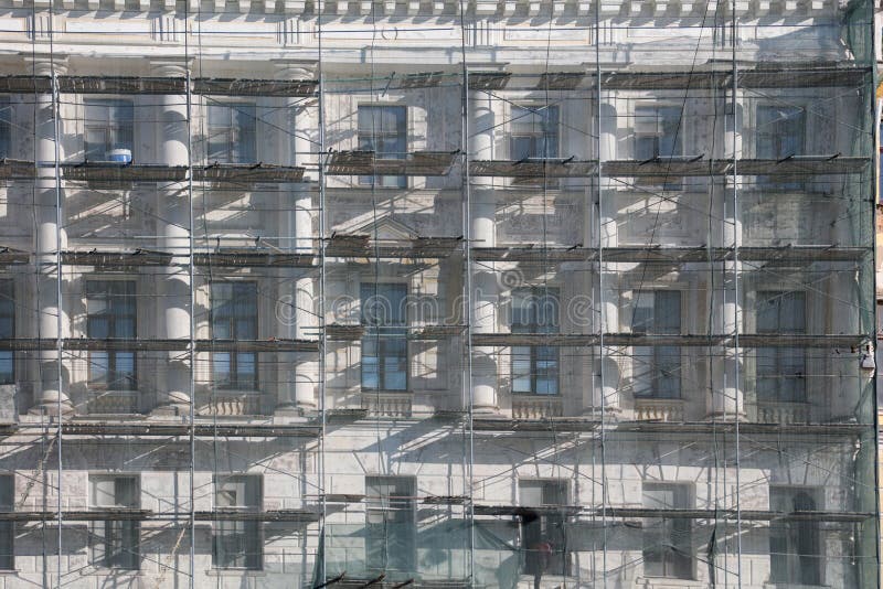 Scaffolding Near the Walls of the Reconstructed Building. Stock Photo ...