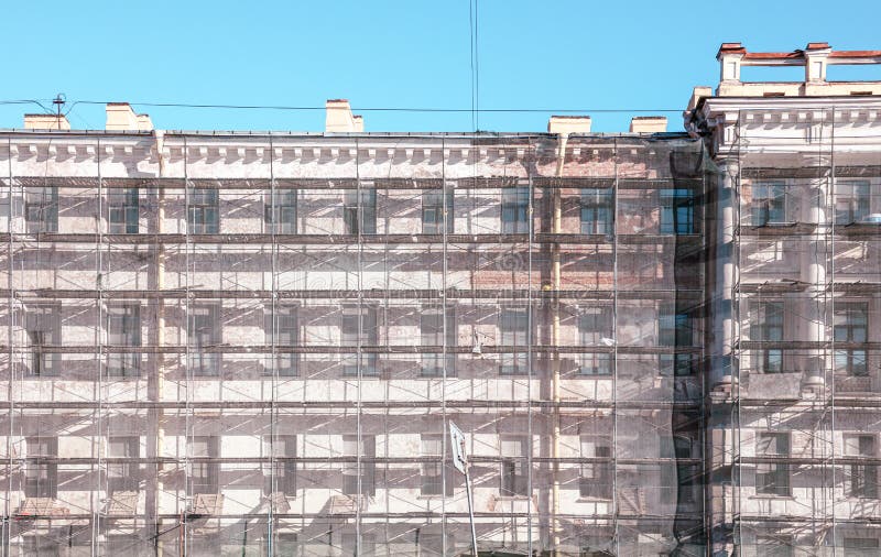 Scaffolding Near the Walls of the Reconstructed Building. Stock Photo ...